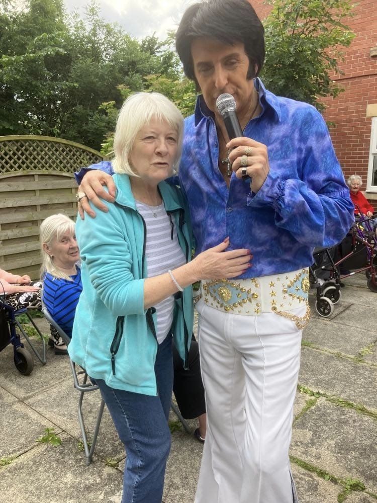 Elvis impersonator brings joy Holywell House Residents - Craig Healthcare
